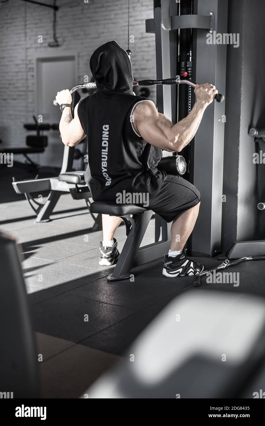 Strong man's workout in gym Stock Photo - Alamy