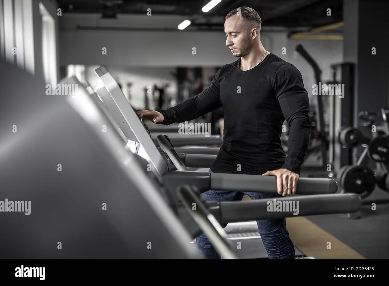 Mighty man on treadmill Stock Photo - Alamy