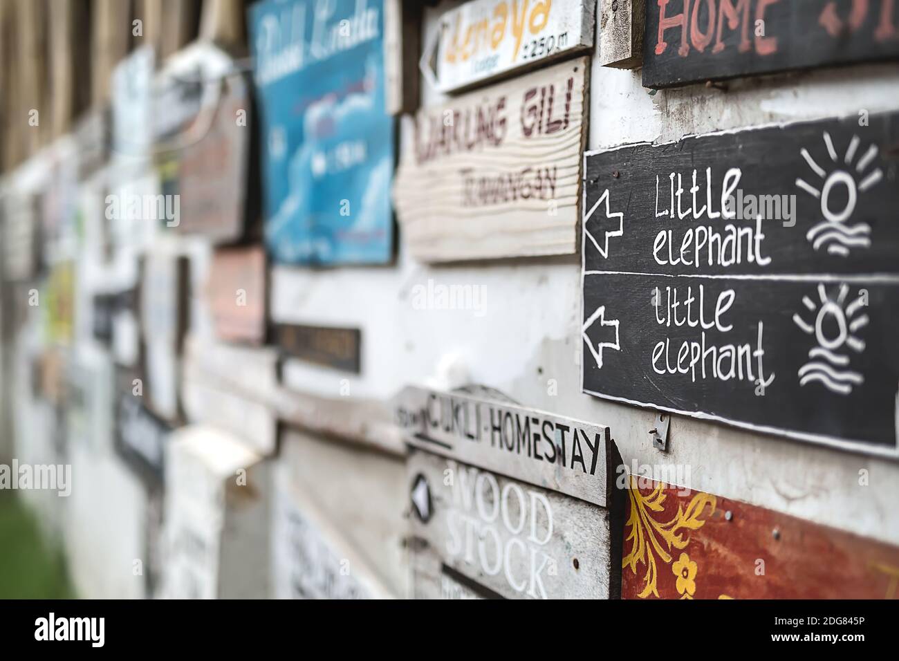 Wall with signboards Stock Photo - Alamy