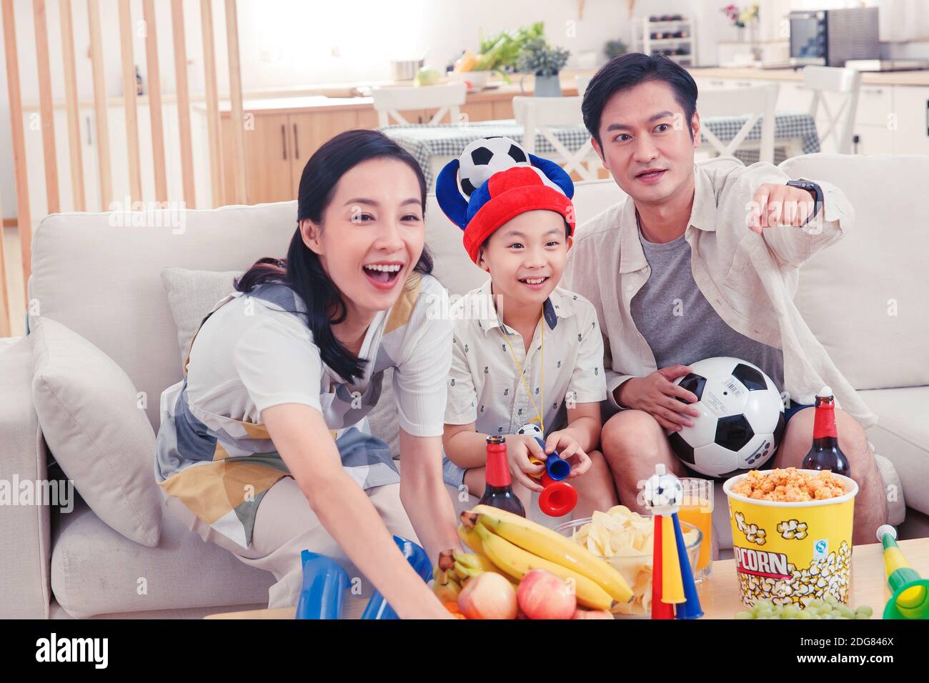 Husband wife family watching game hi-res stock photography and images ...