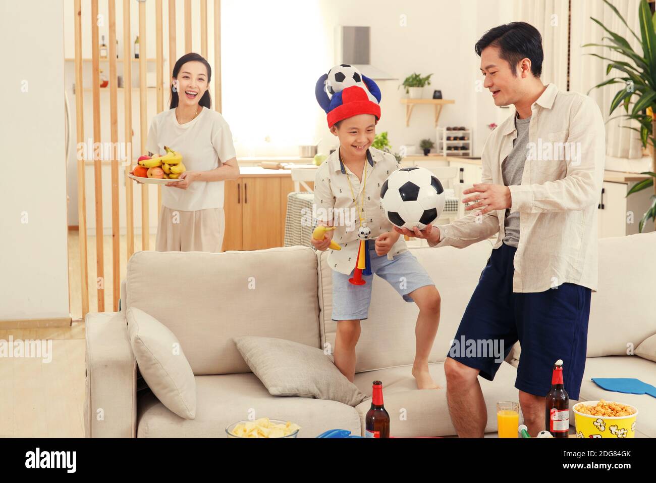 Happy to play the family at home Stock Photo - Alamy