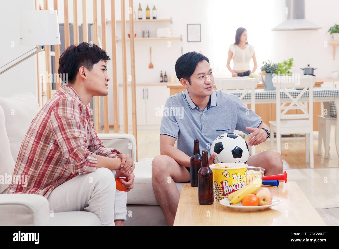 See a ball game friends at home Stock Photo - Alamy