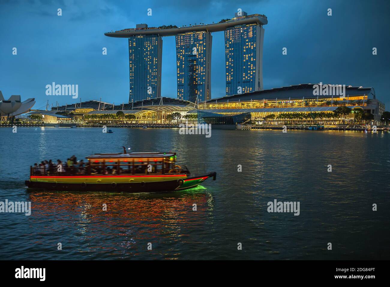 Floating boat on glowing waterfront background Stock Photo - Alamy