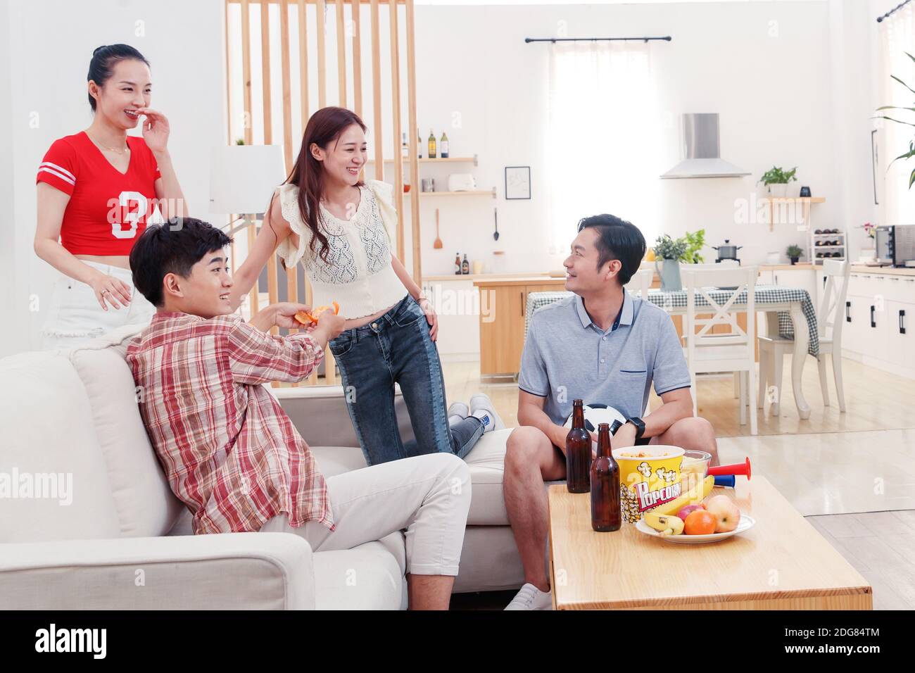 Friends sofa wine fruit hi-res stock photography and images - Alamy