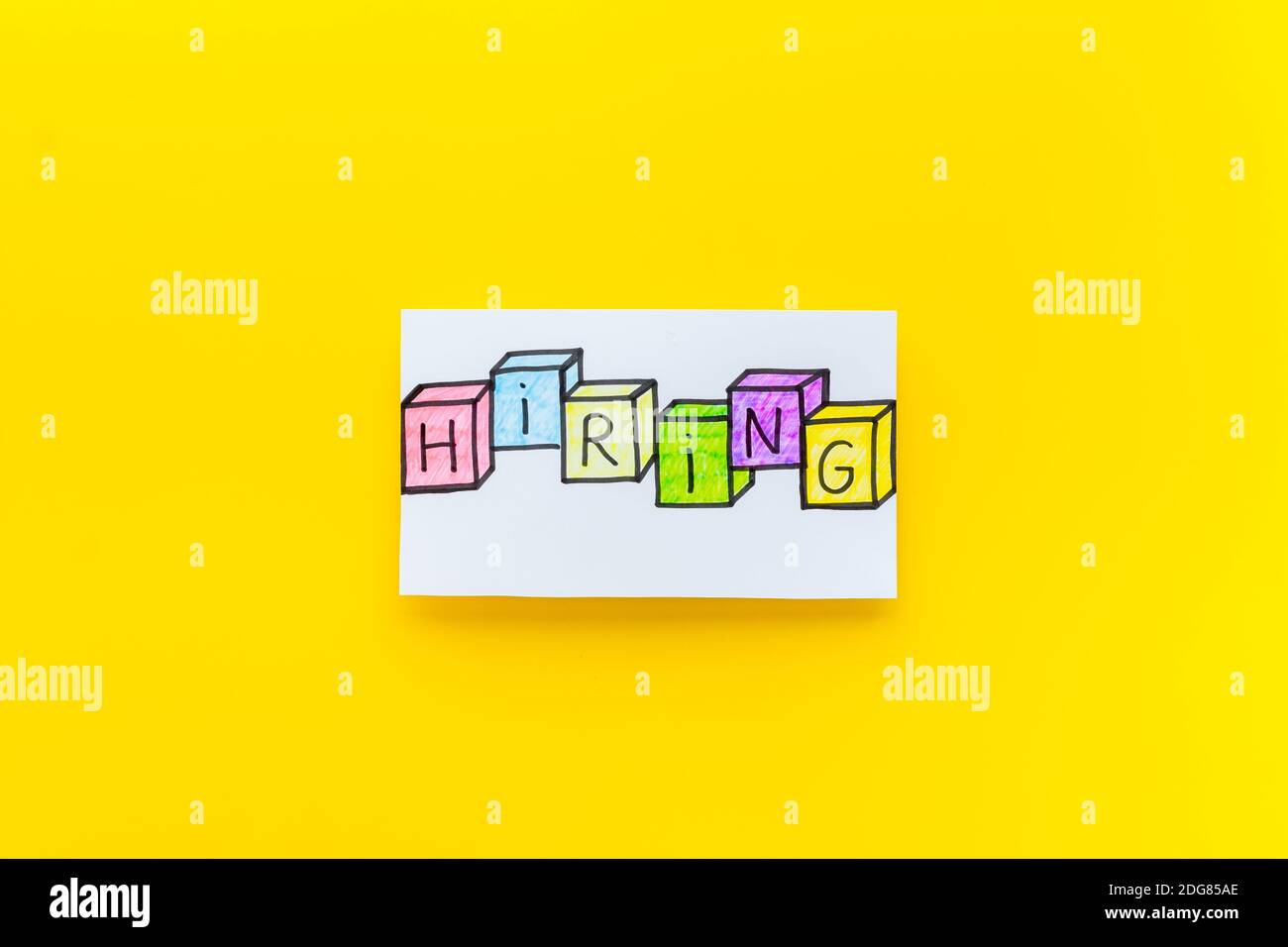 Hiring - job recruting concept. Word Hiring on paper banner, top view ...