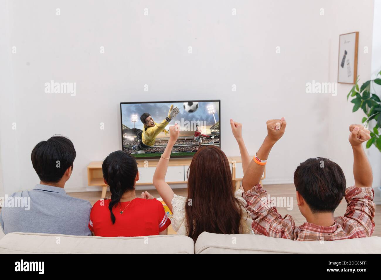 Rear view friends watching game hi-res stock photography and images - Alamy