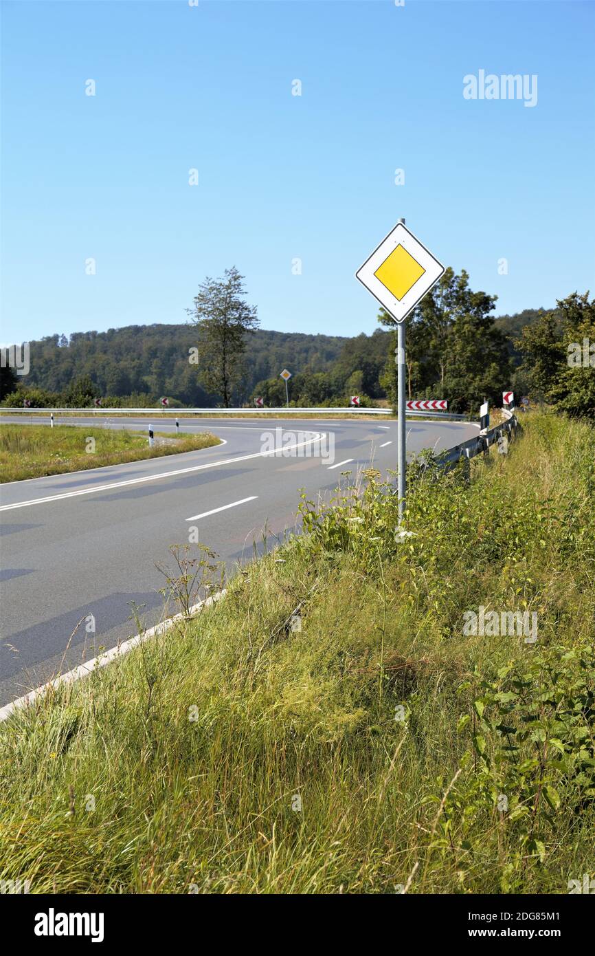 road sign on the road Stock Photo - Alamy