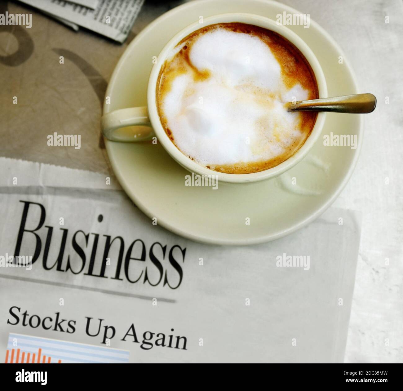 Coffee and good stock market news Stock Photo - Alamy
