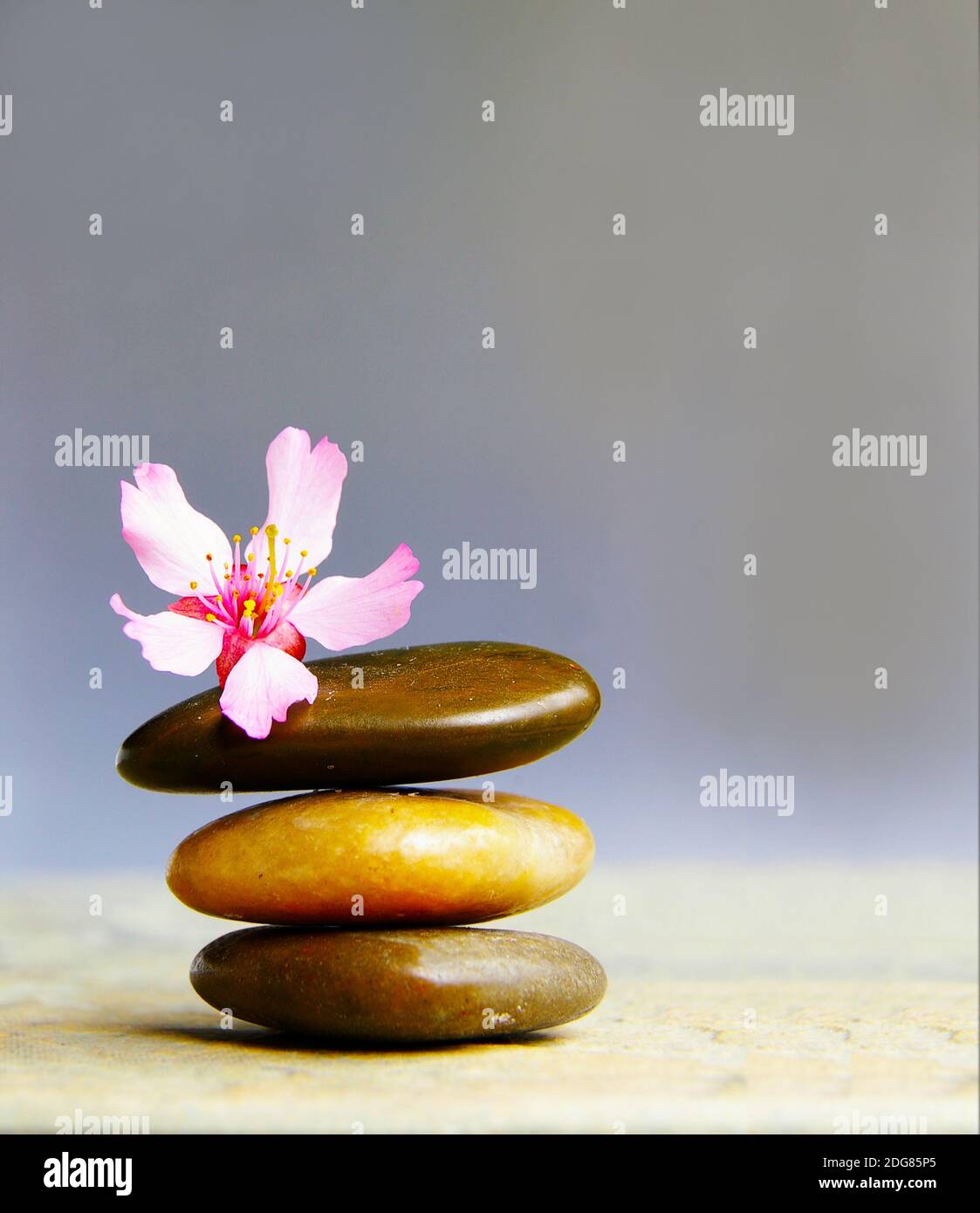 Three stacked stones hi-res stock photography and images - Alamy