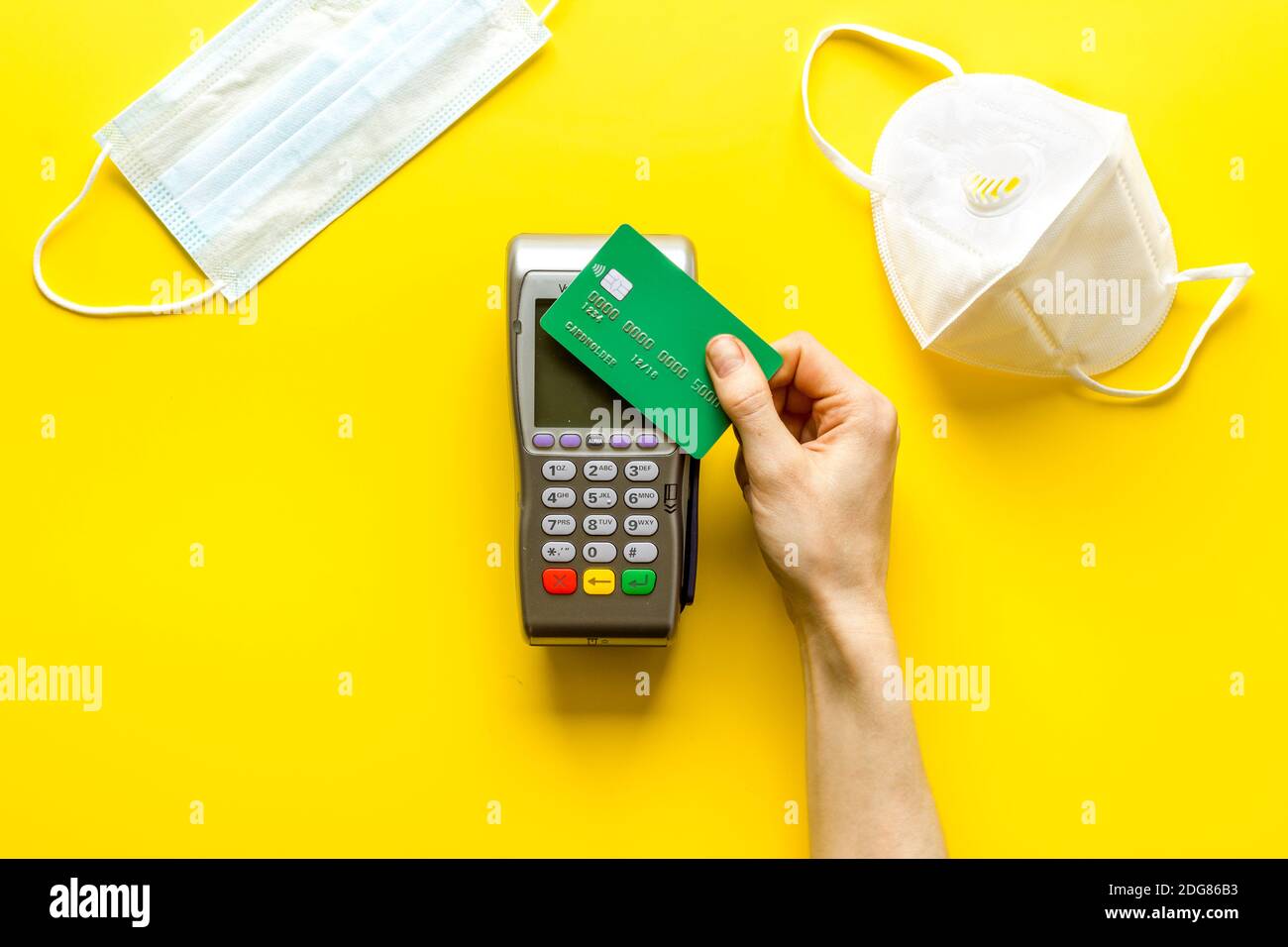 Contactless payment - terminal with medicine face masks, top view Stock ...