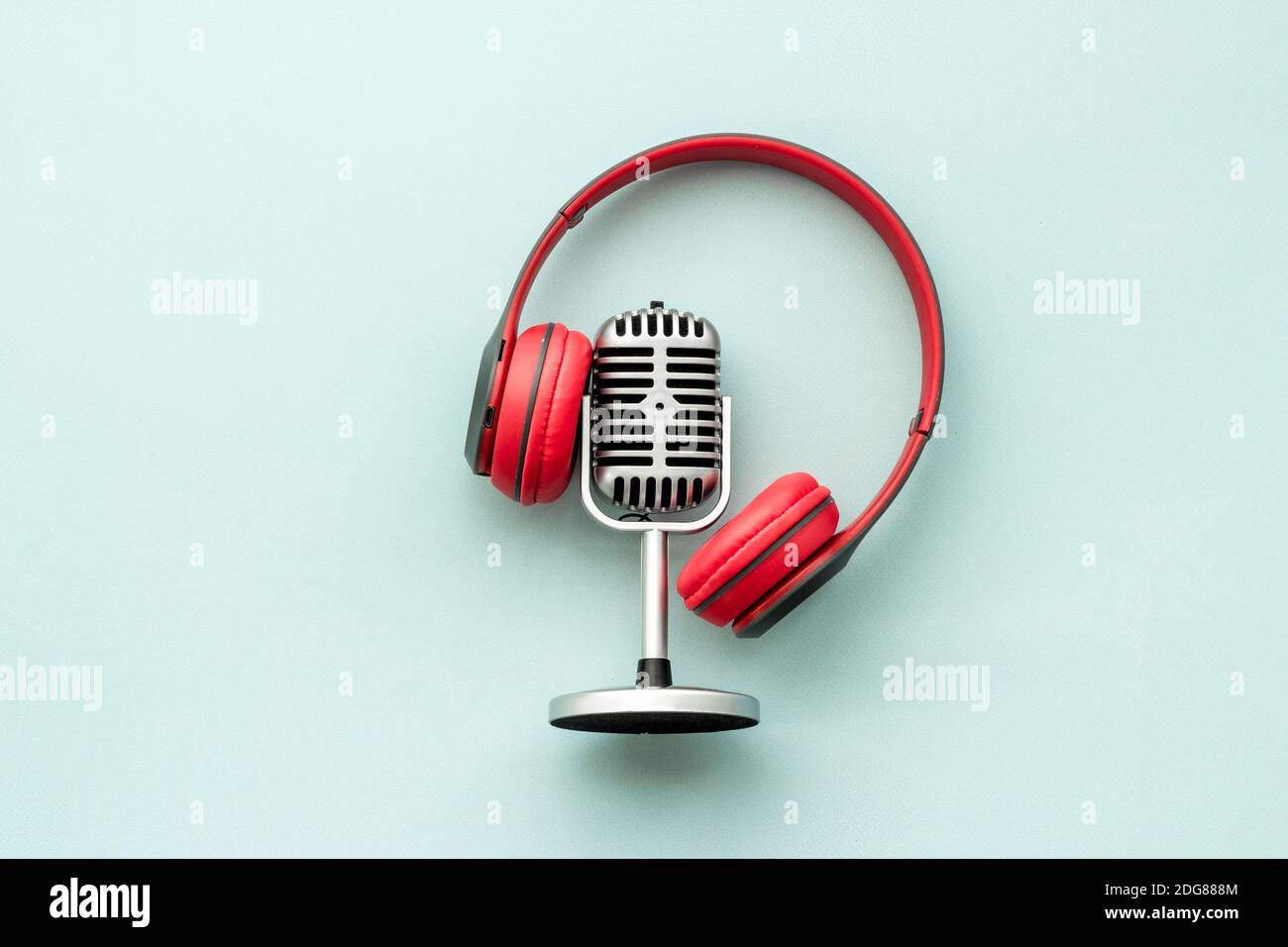 Podcast and streaming record. Microphone and headphones on table, top ...