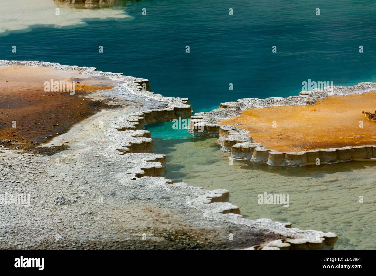 Colorful geothermal feature, Doublet Pool with scalloped geyserite ...