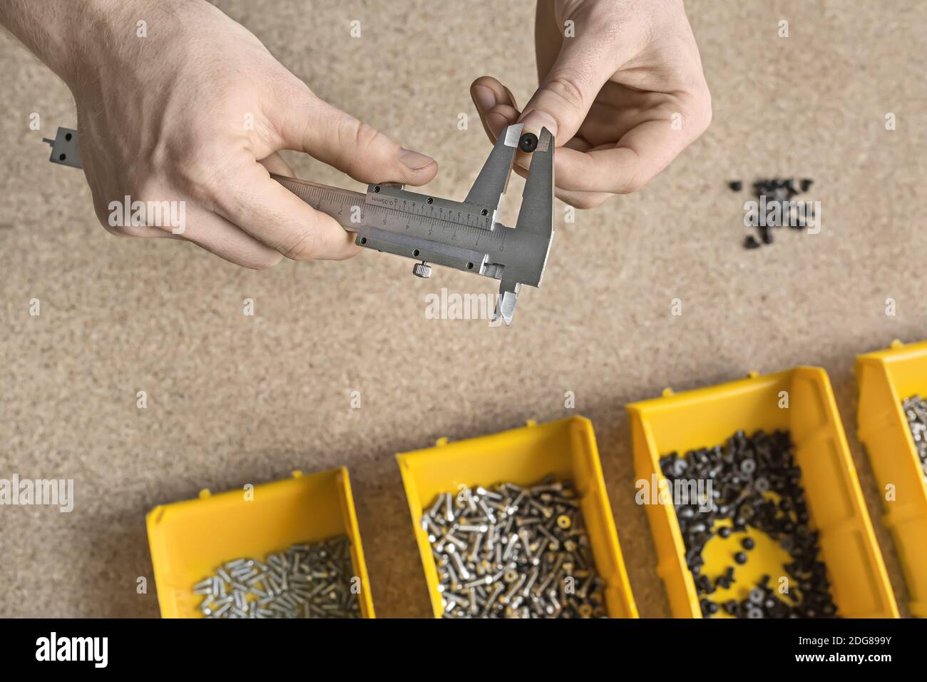 Man using caliper in workshop Stock Photo - Alamy