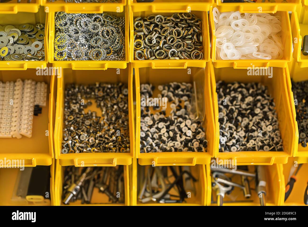 Plastic yellow boxes with instruments Stock Photo - Alamy