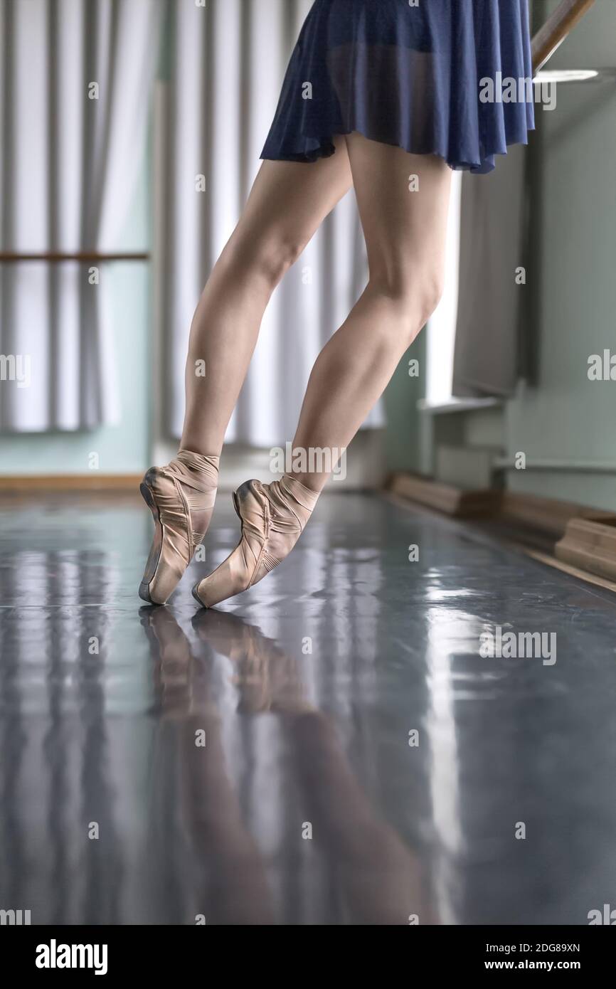 Legs of dancer in ballet hall Stock Photo - Alamy