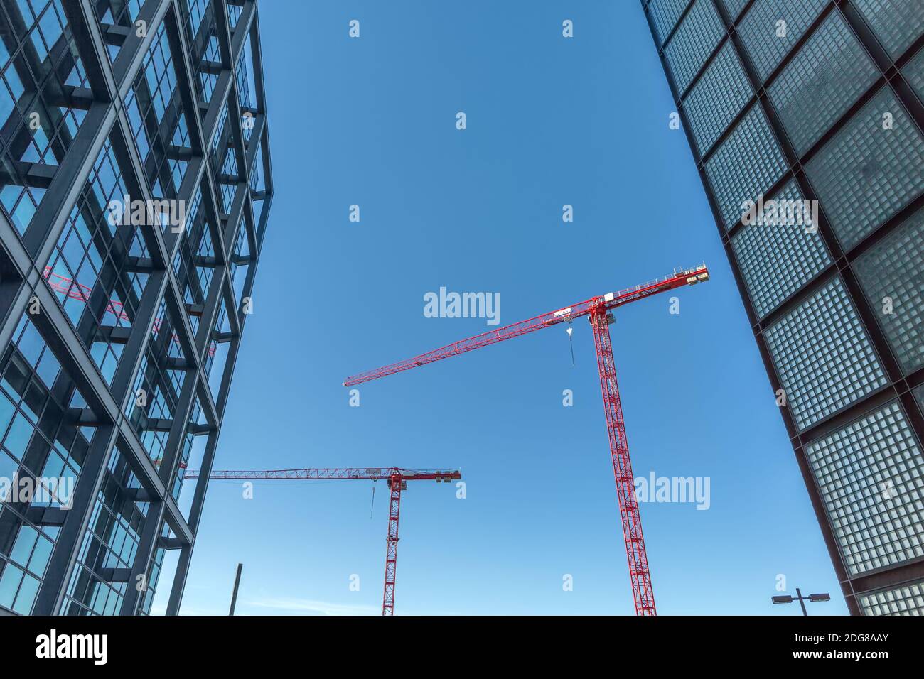 Red tower cranes hi-res stock photography and images - Alamy