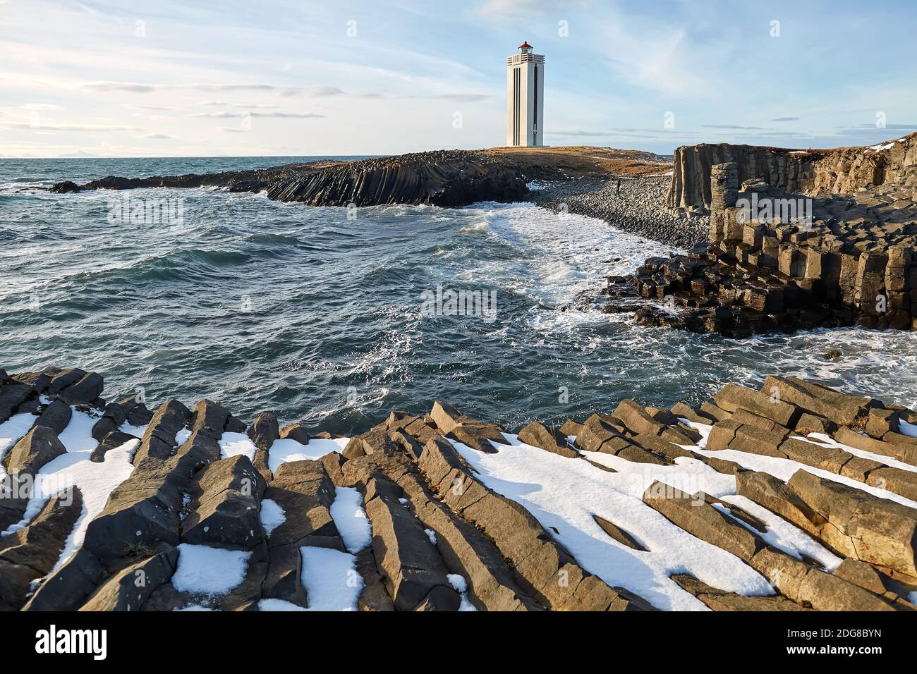 Landscape with lighthouse on promontory Stock Photo - Alamy