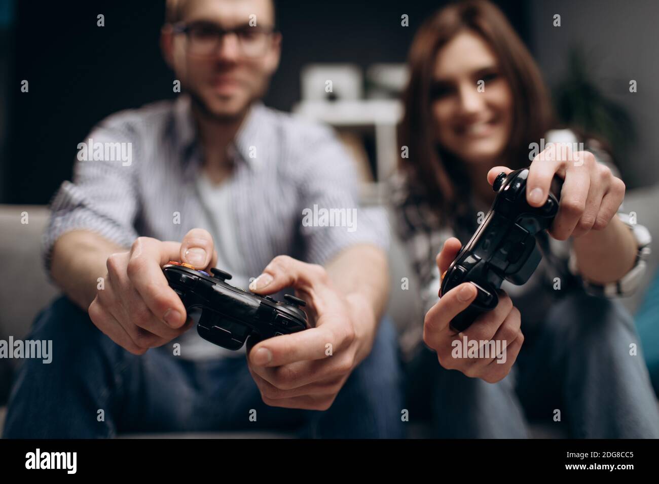 Woman man hands joysticks hi-res stock photography and images - Alamy