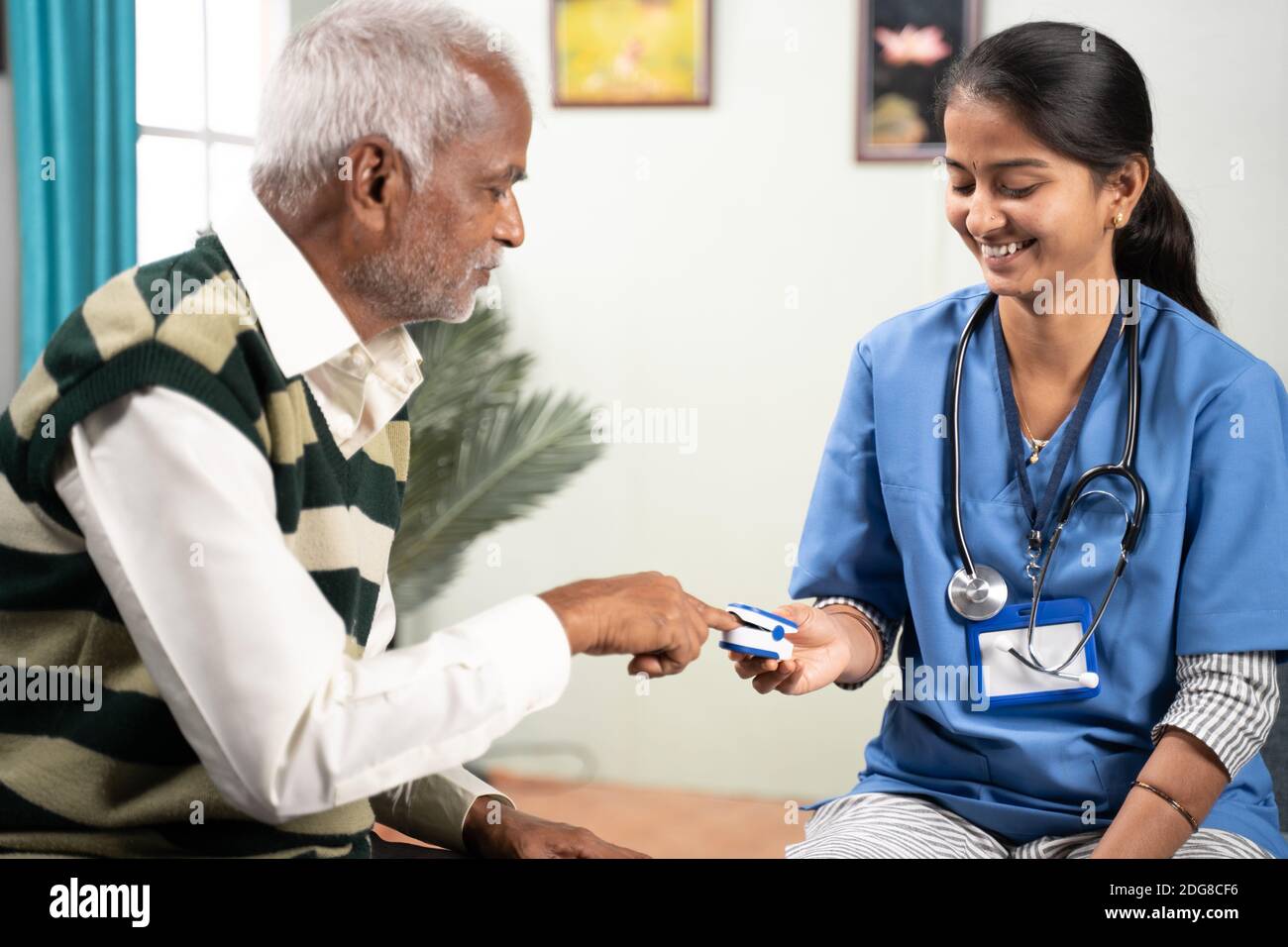 Concept of home health visit or service - doctor or nurse checking ...