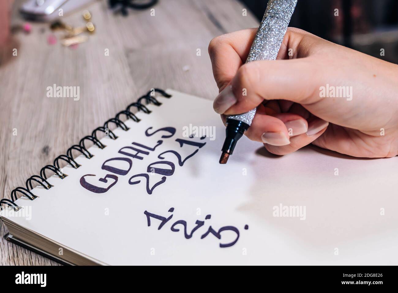 Goals 2021 concept. 2021 plan notepad list concept, hand writting ...