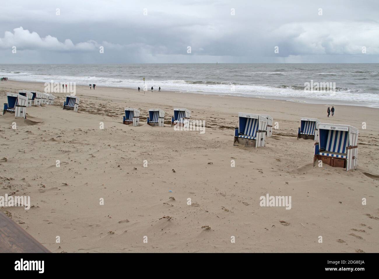 Beach chairs after a storm Stock Photo - Alamy