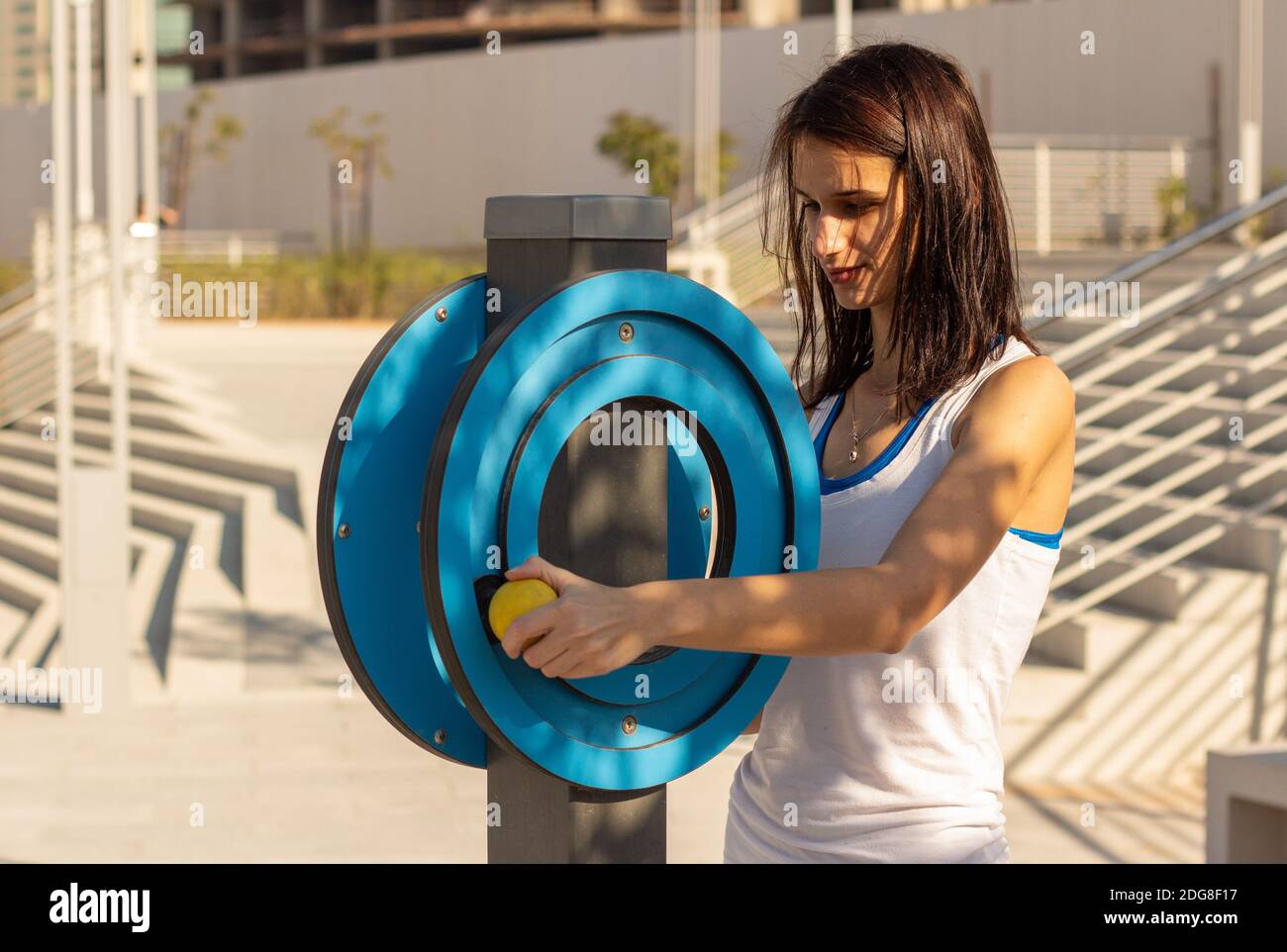 A woman is doing circular hand exercise Stock Photo - Alamy