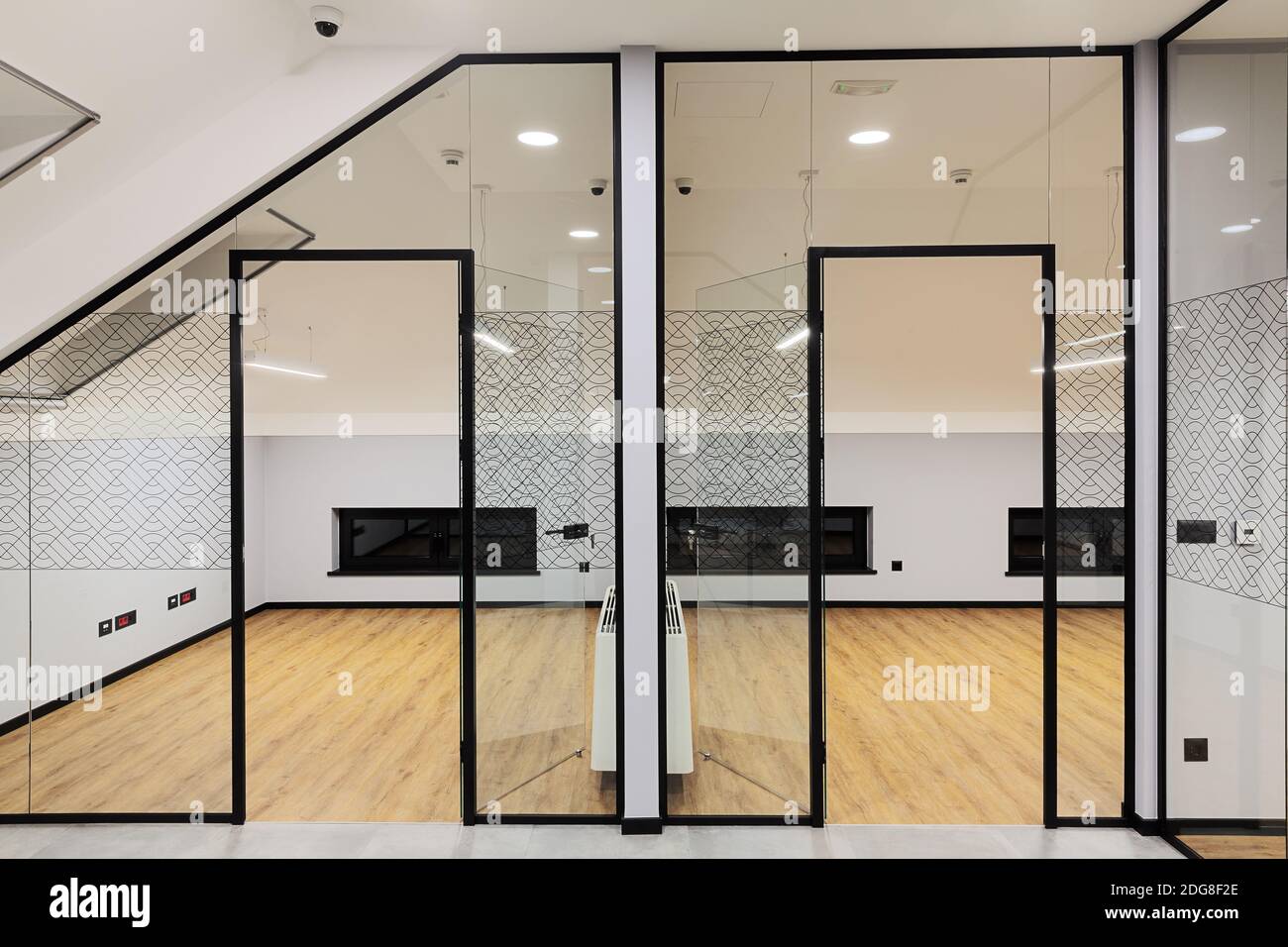 Interior of a new and empty offices, modern and simple Stock Photo - Alamy
