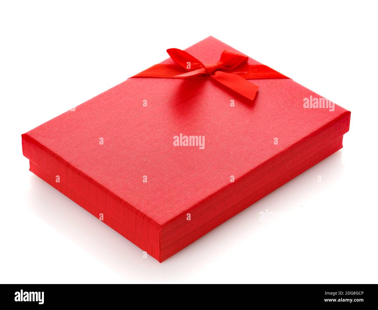 Red gift box with red ribbon bow isolated on white background. Side ...