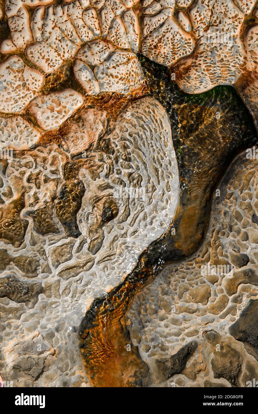 Abstract natural rocky background of the stones with spring water ...
