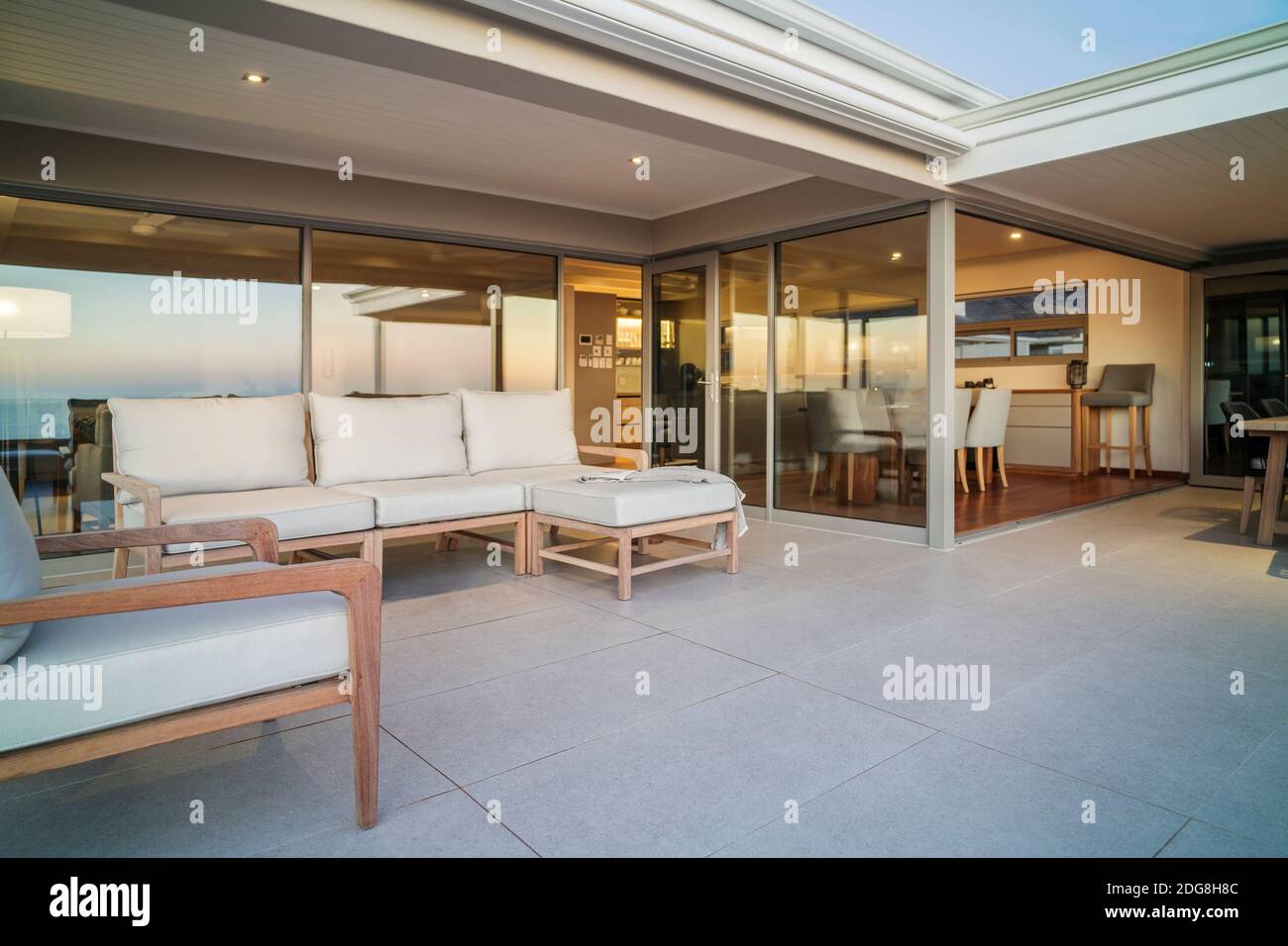 Sofa on luxury home showcase exterior patio Stock Photo - Alamy