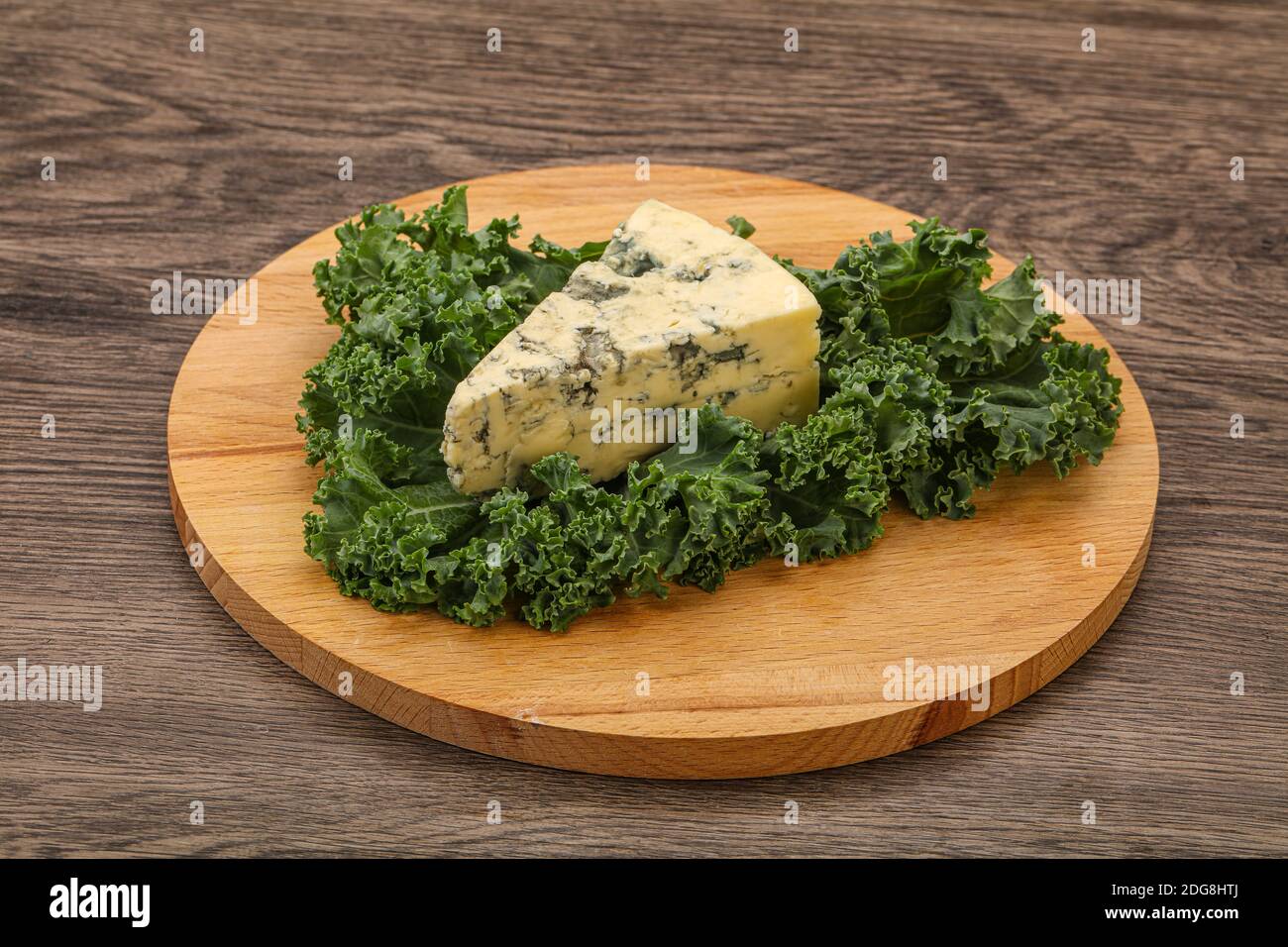 Dairy Blue cheese triangle with mold Stock Photo - Alamy