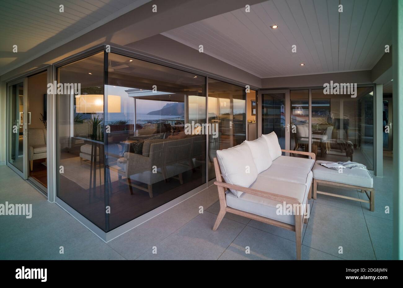 Sofa on luxury home showcase exterior patio Stock Photo - Alamy