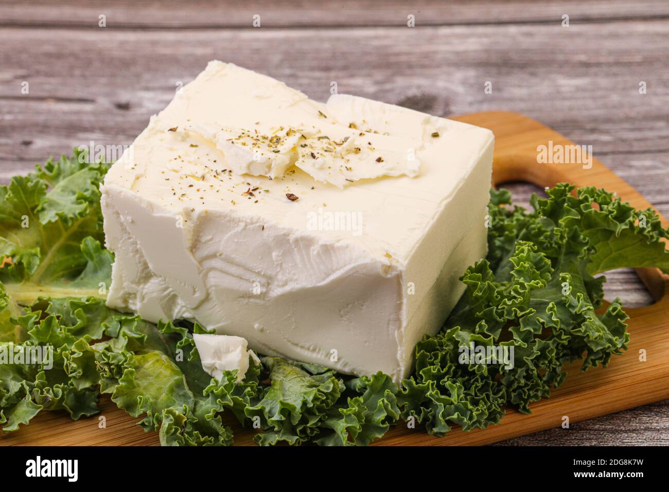 Traditional tasty Greek Feta soft cheese brick Stock Photo - Alamy