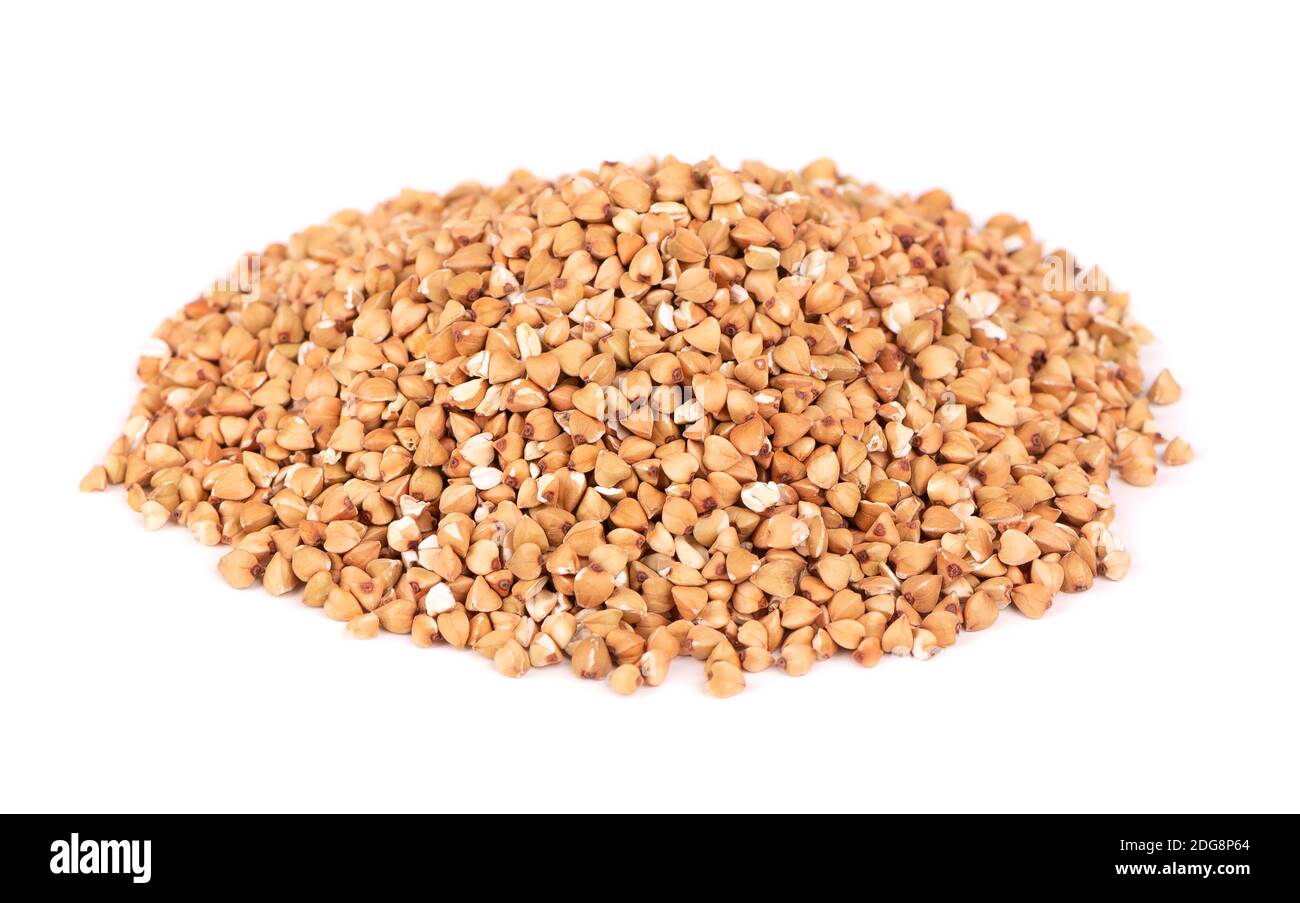 Buckwheat groats isolated on white background. Green buckwheat seeds ...