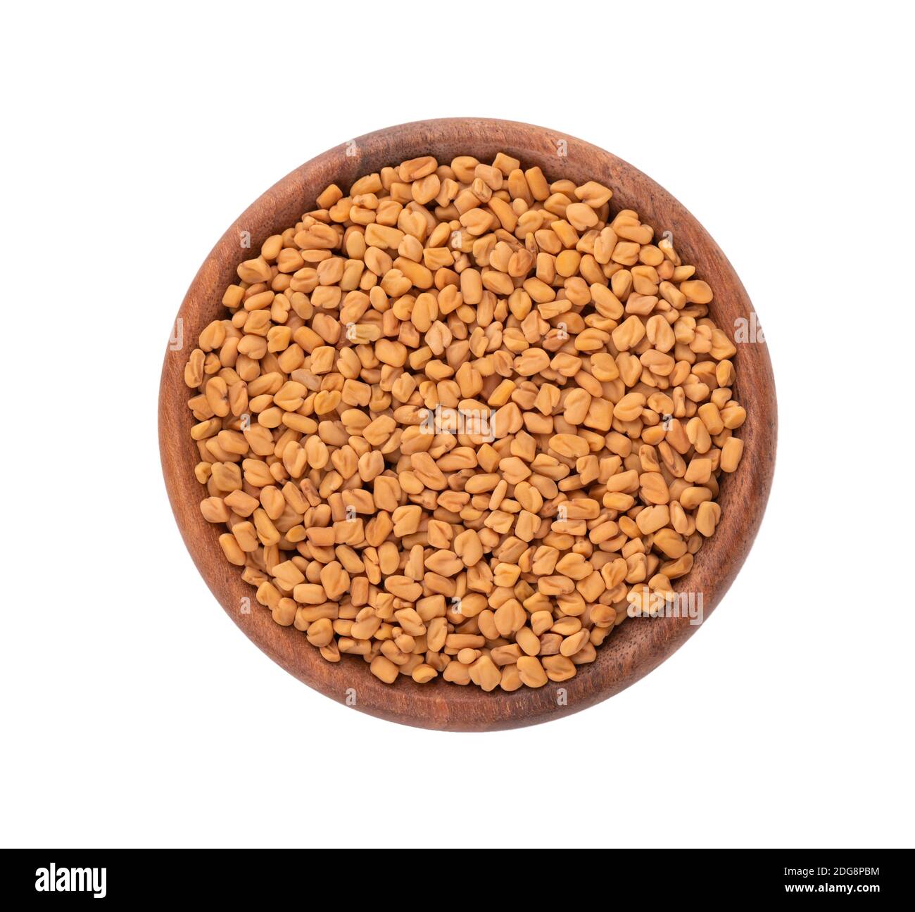 Fenugreek seeds in wooden bowl, isolated on white background. Shambala ...