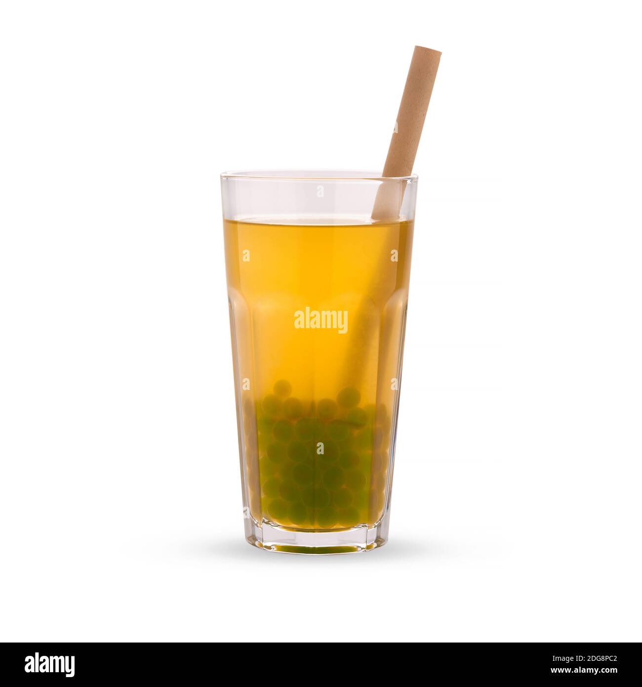 Yellow bubble tea with green tapioca pearls in glass beaker, isolated ...