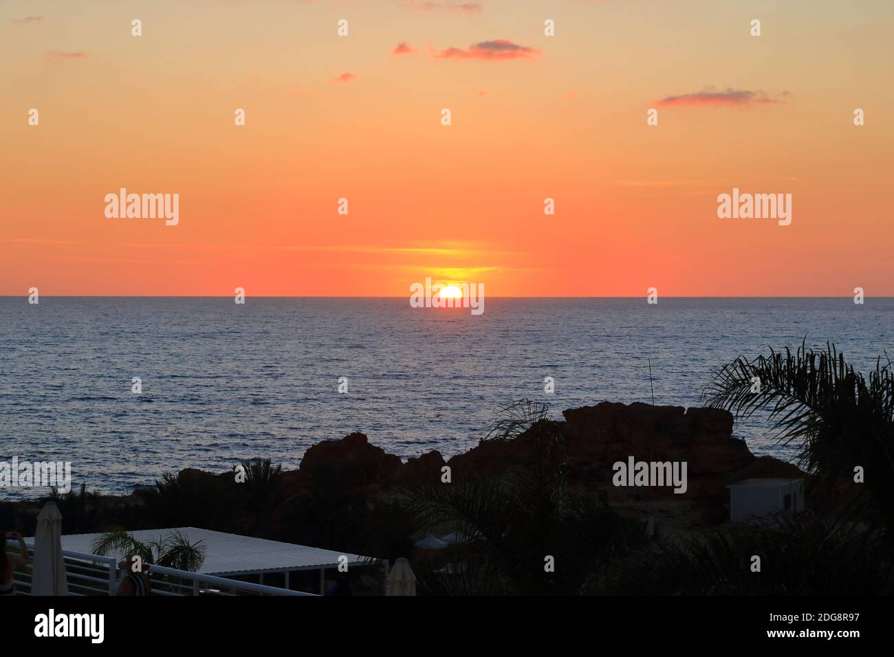 Beautiful sunset above the sea in Paphos in Cyprus Stock Photo - Alamy