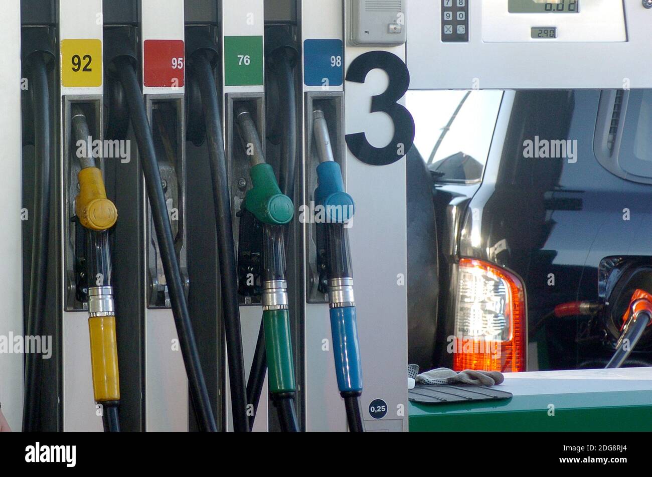 Green color fuel pump gun hi-res stock photography and images - Alamy