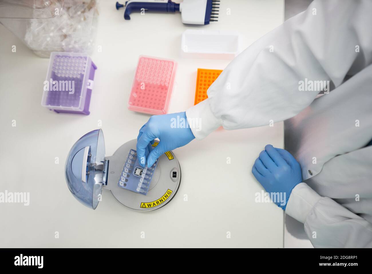 Scientist work in gloves hi-res stock photography and images - Alamy