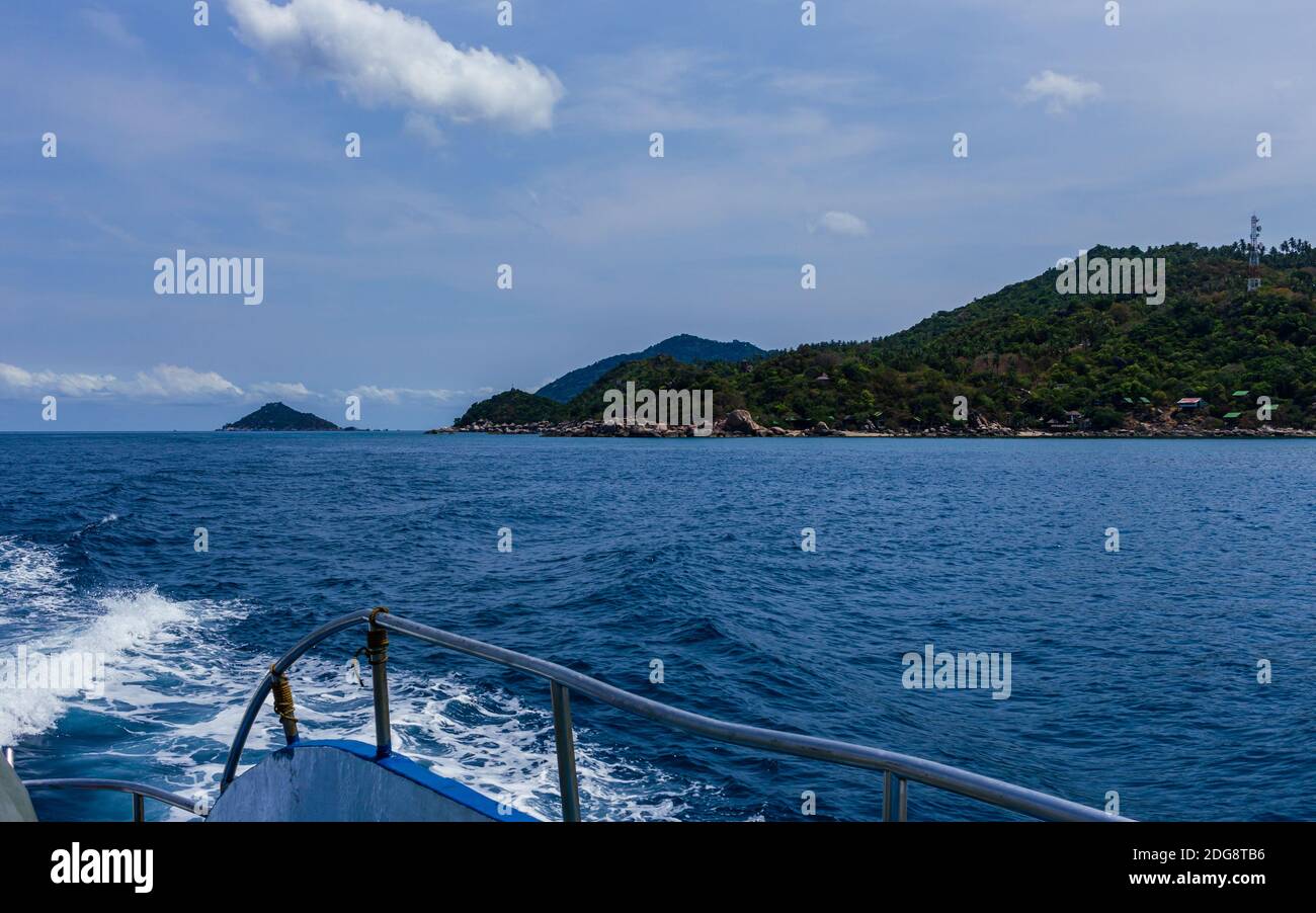 Koh Tao island view from ferry moving ship, blue water waves at summer ...