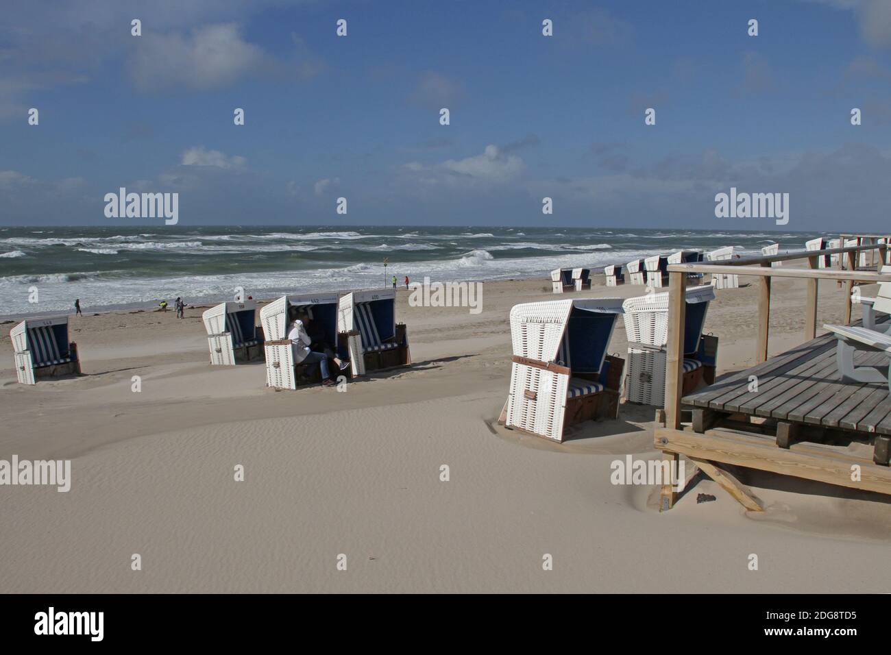 Beach chairs after a storm Stock Photo - Alamy