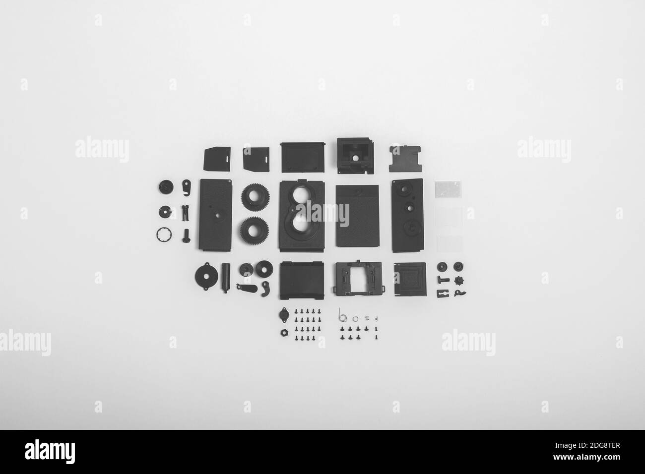 A top view shot of twin-lens vintage open camera kit pieces isolated on ...