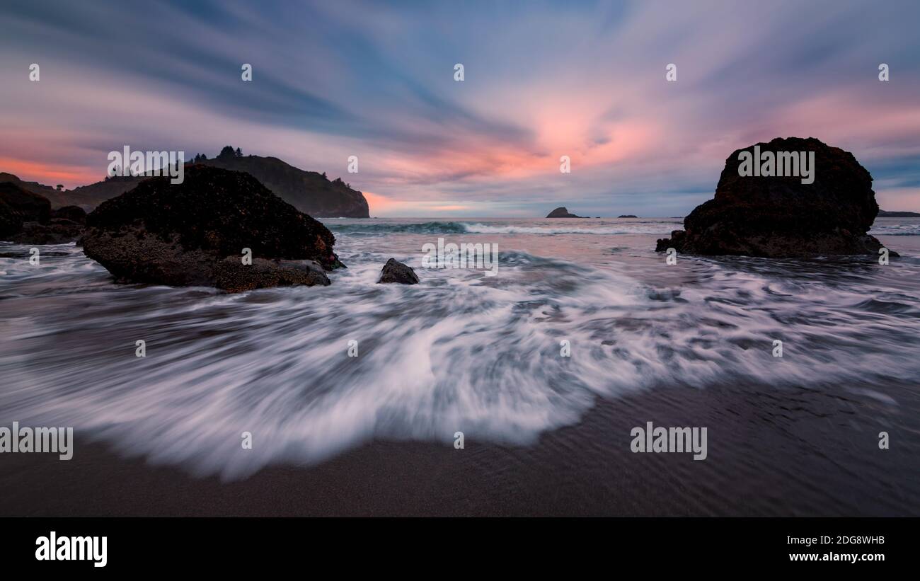 Rocky Beach Landscape at Sunset Stock Photo - Alamy