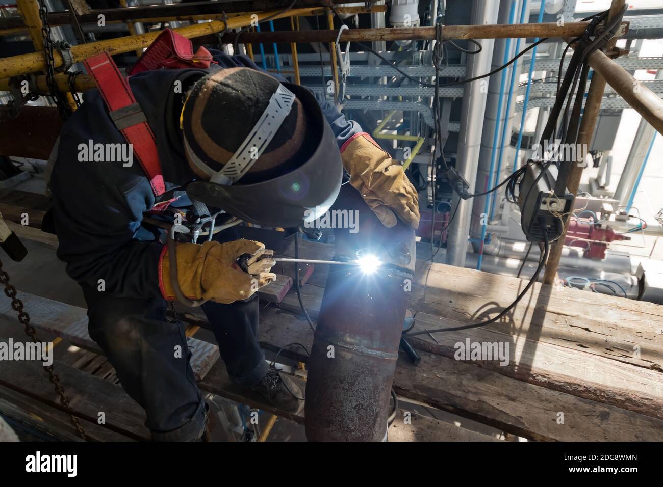 Welding works at installation of new pipeline Stock Photo - Alamy