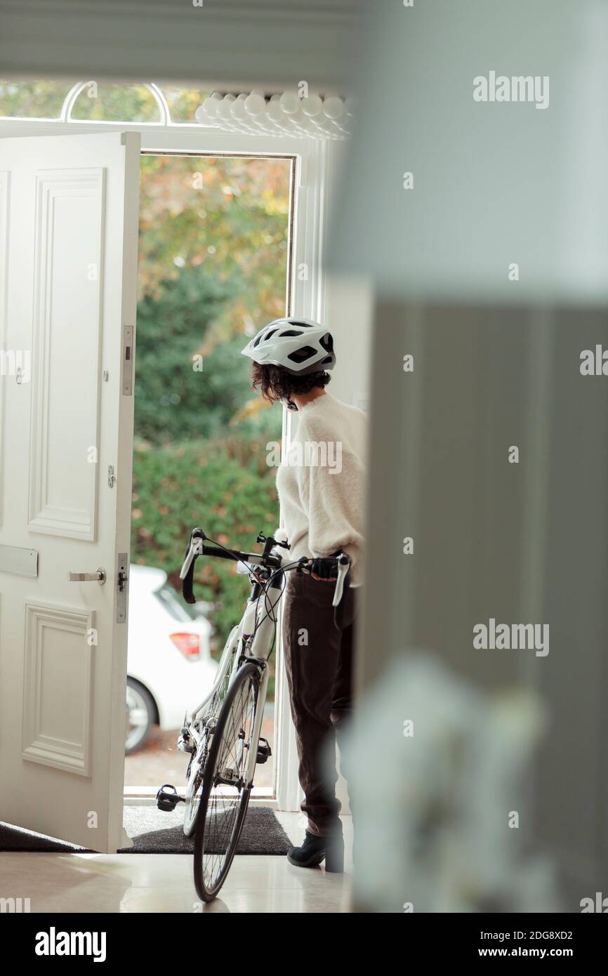 Woman returning bike hi-res stock photography and images - Alamy