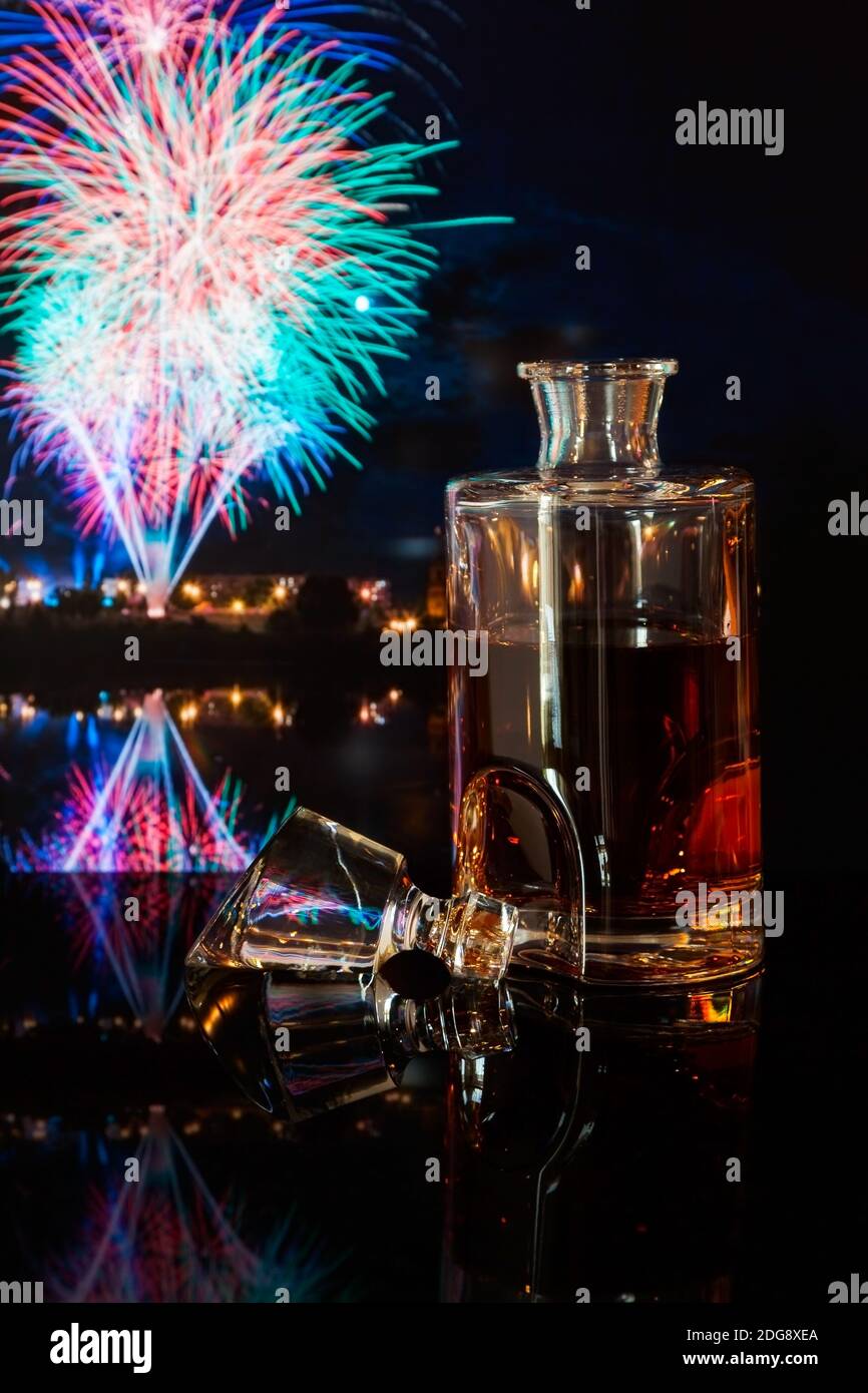 Bottle of whiskey in the night fireworks Stock Photo - Alamy