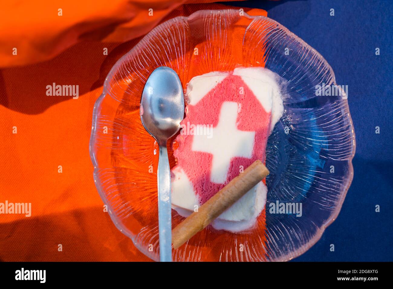 Delicious Switzerland flag ice cream with metal spoon Stock Photo - Alamy