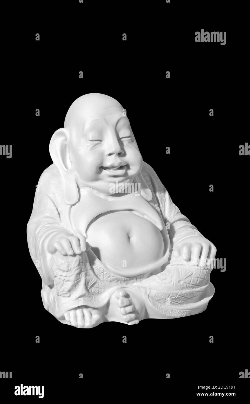 Statues of netsuke on a black background Stock Photo - Alamy