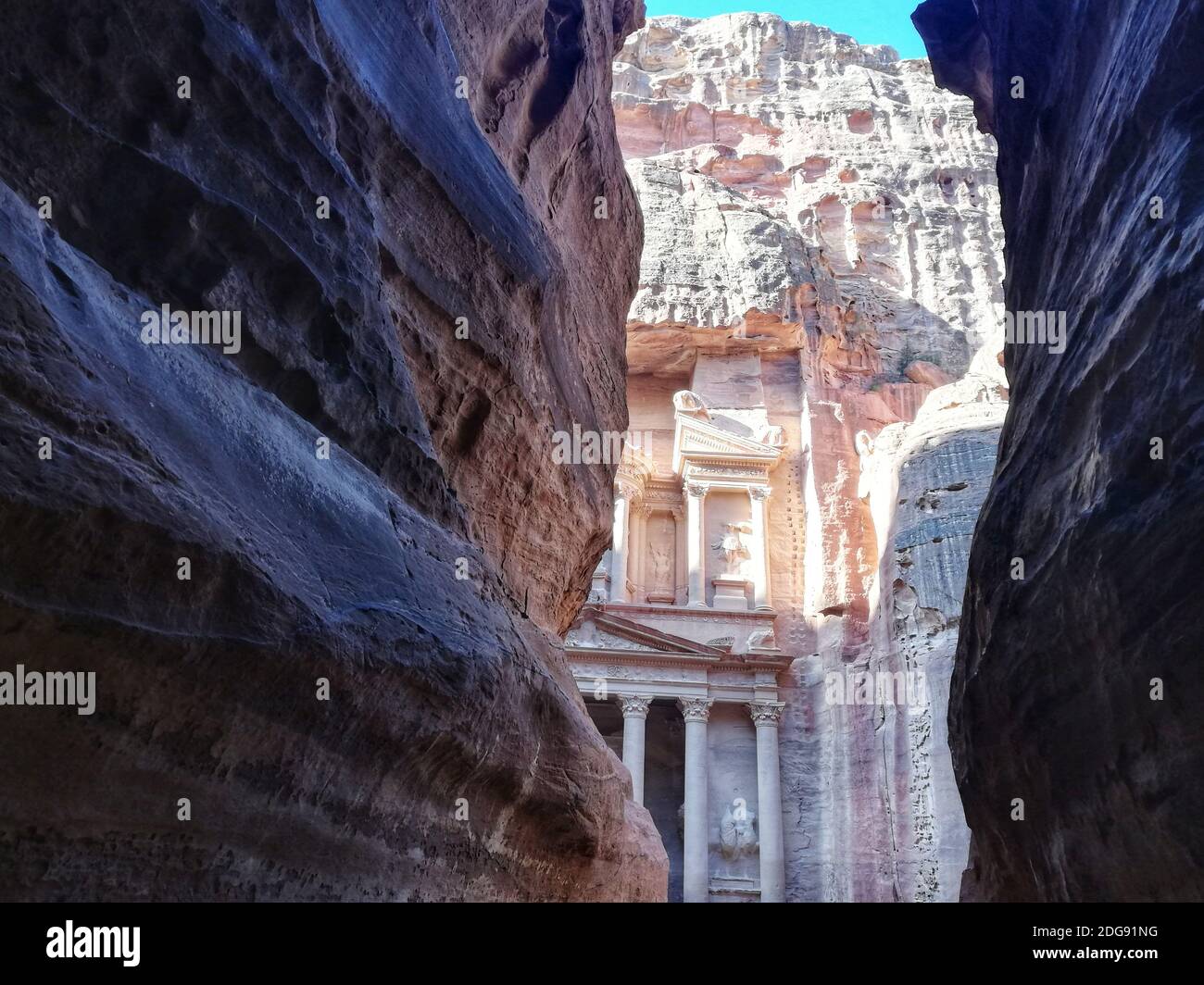A low angle shot through the rocks o Great Temple in Jordan Stock Photo ...