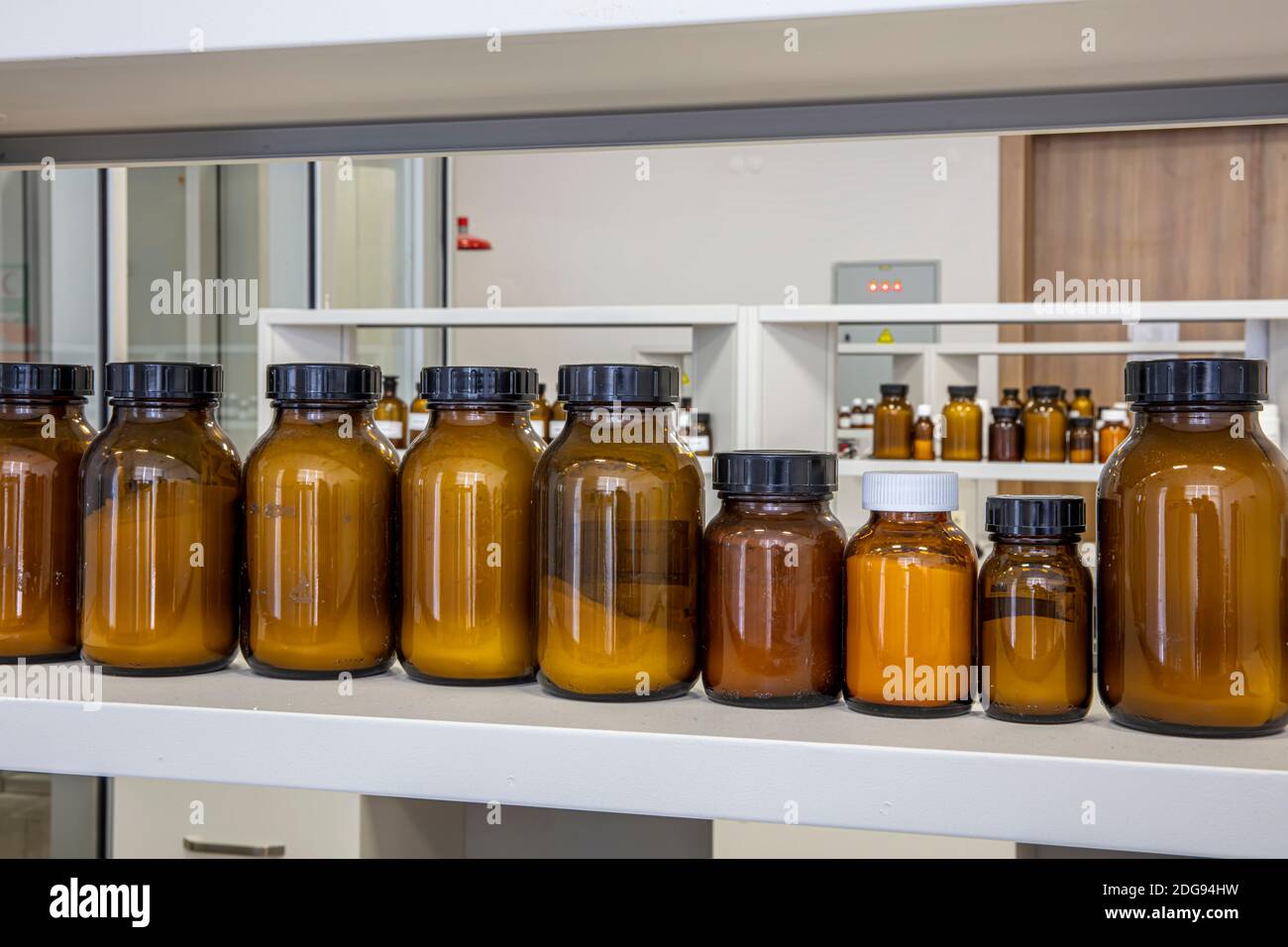 Close up amber color bottles in laboratory. Amber bottle for storing ...